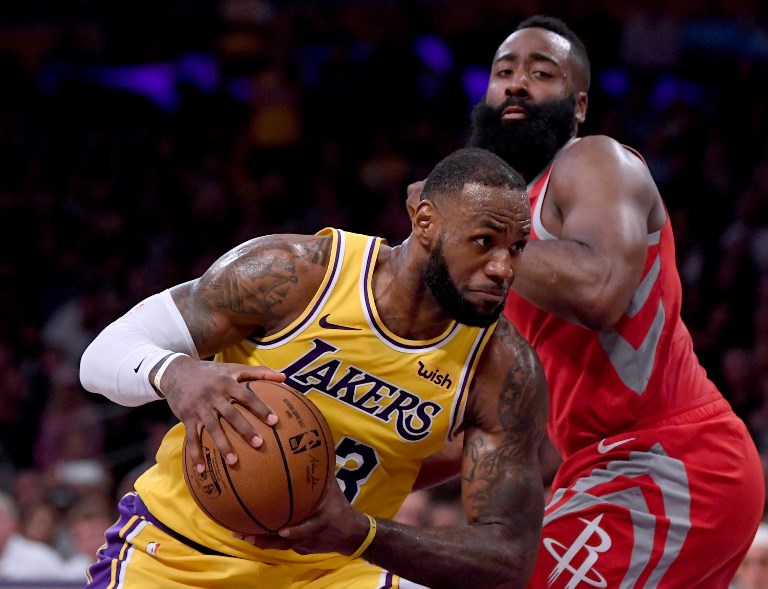 Rockets spoil James' home debut in fight-marred game