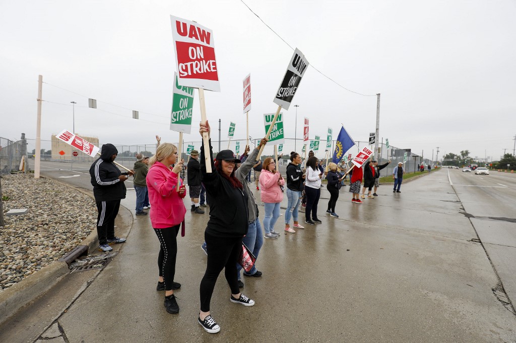 Almost 50,000 GM workers on strike, auto-maker shares slide