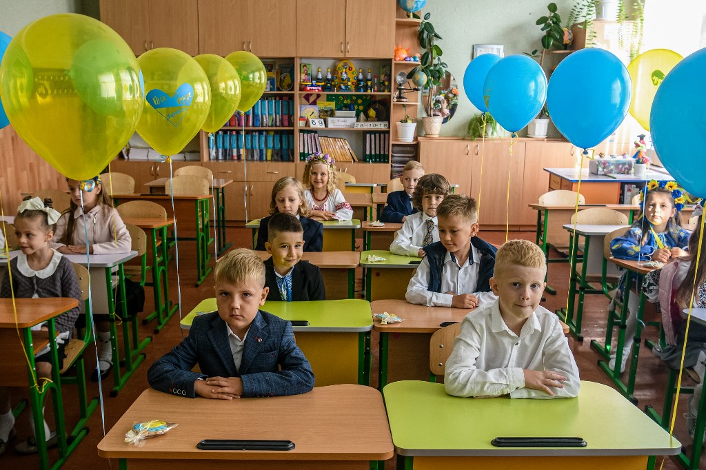 Ukraine schools return to sound of war
